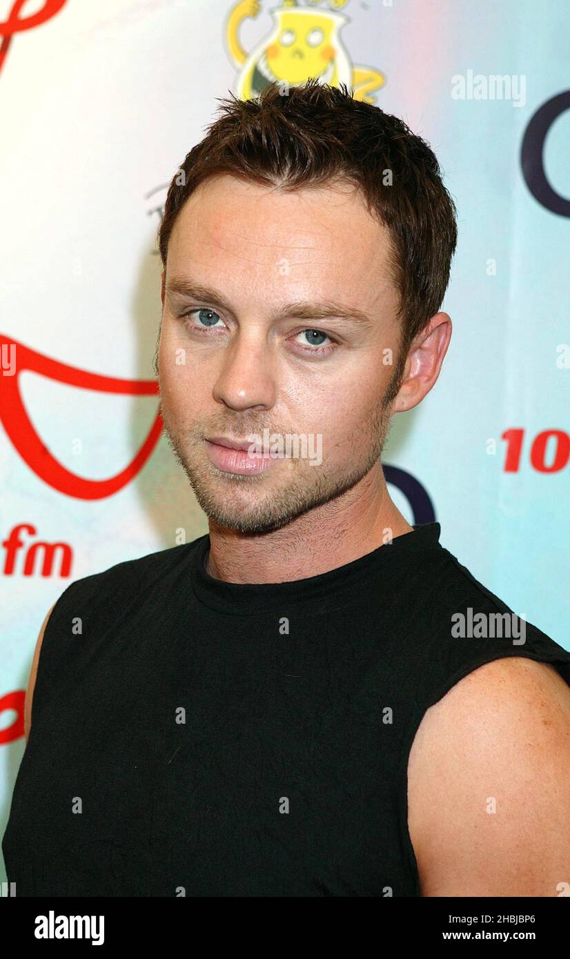 Darren Hayes poses back stage at the Fox FM Party in the Park in ...