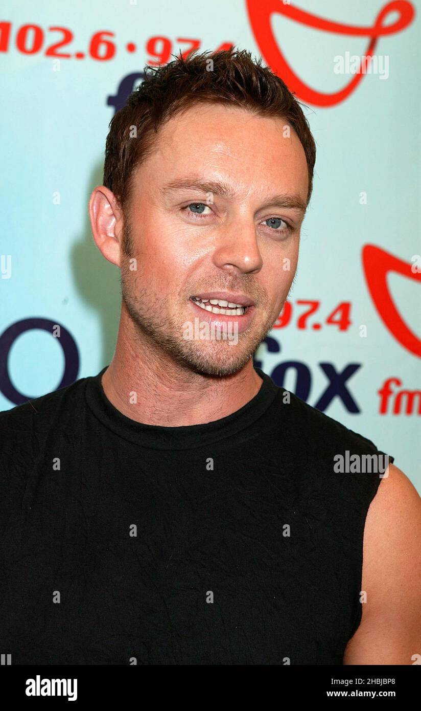 Darren Hayes poses back stage at the Fox FM Party in the Park in ...