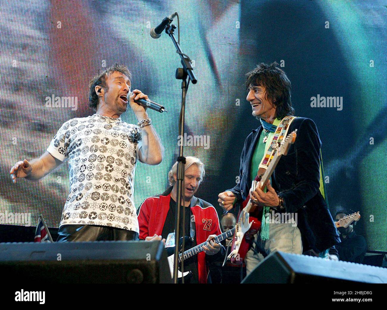 Ronnie Wood of the Rolling Stones performs on stage with Paul Rogers ...