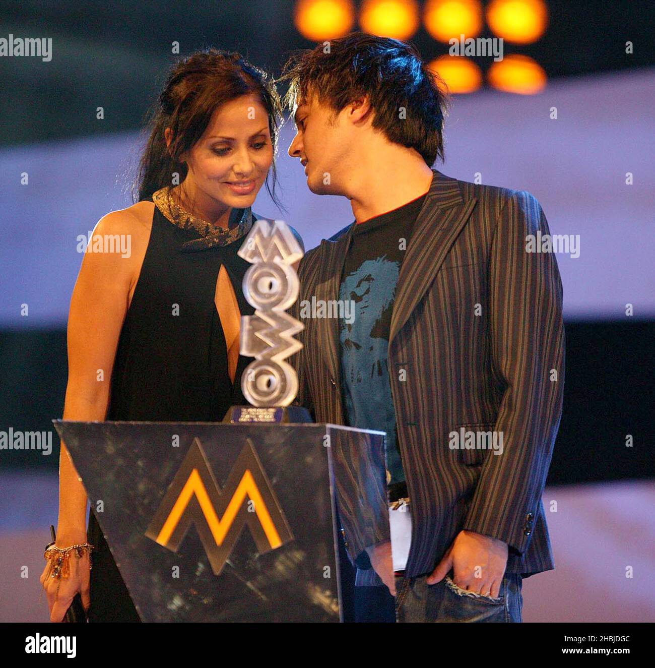 Natalie Imbruglia present an award on stage to Jamie Cullum at the Mobo ...