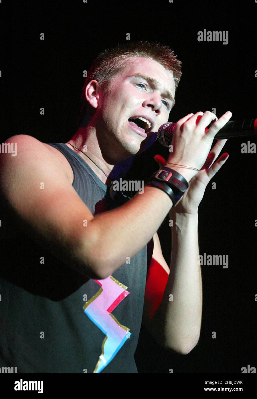 Kevin McDaid of "V" supports McFly performing on stage on the ...