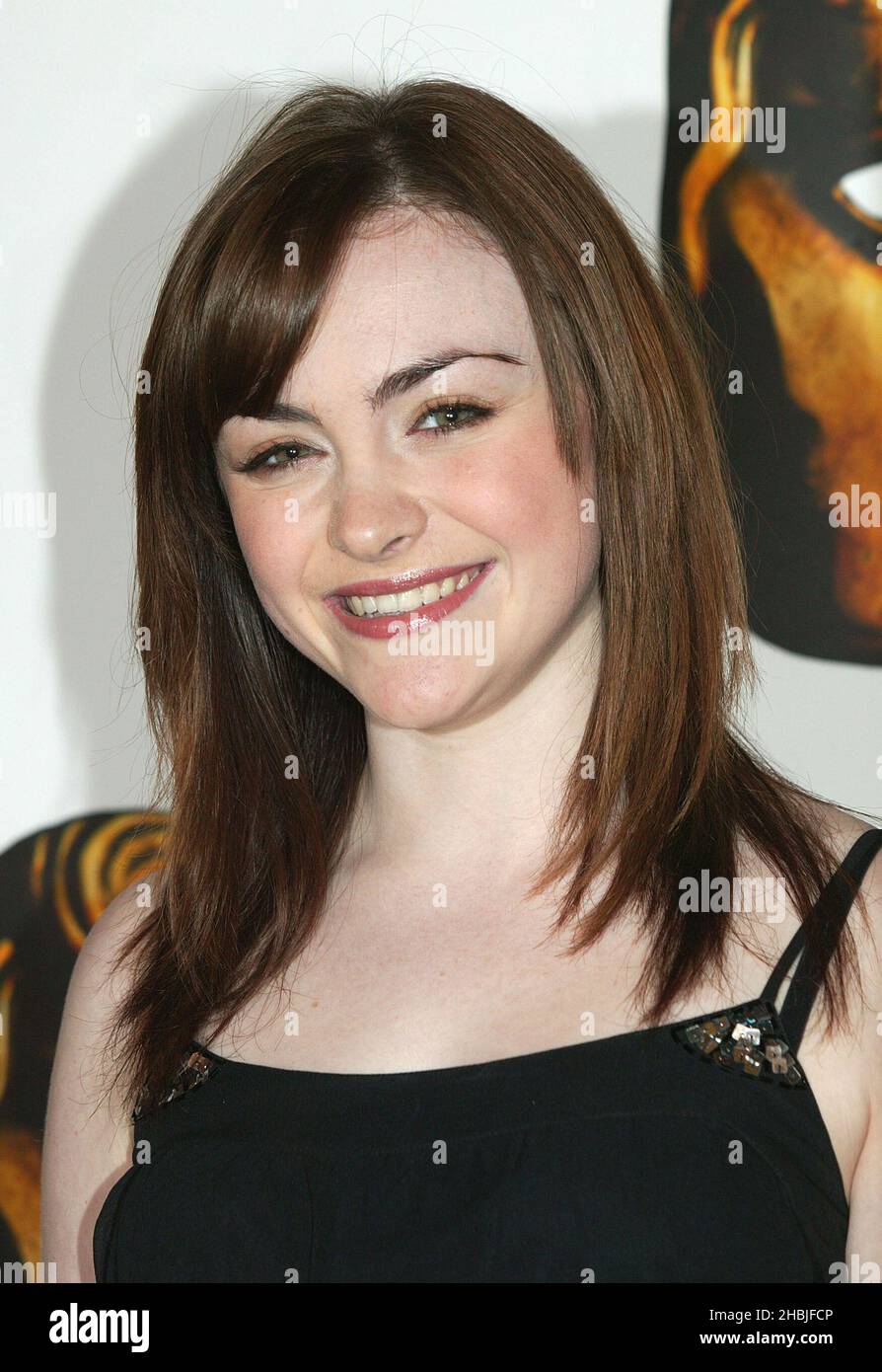 Cassie Compton poses at the boards in the press room at the "British ...