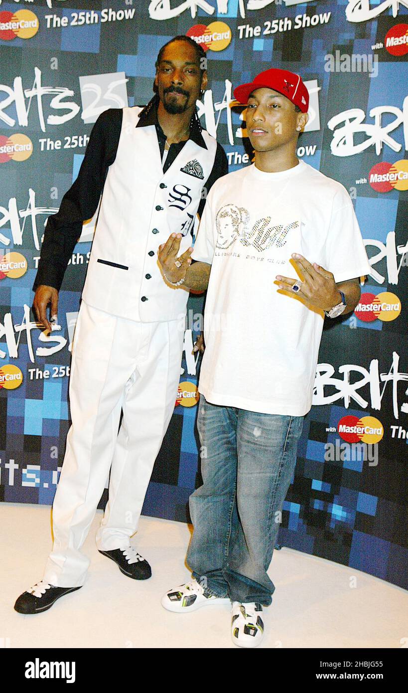 Snoop Dog and Pharrell Williams pose in the press room at the 25th ...