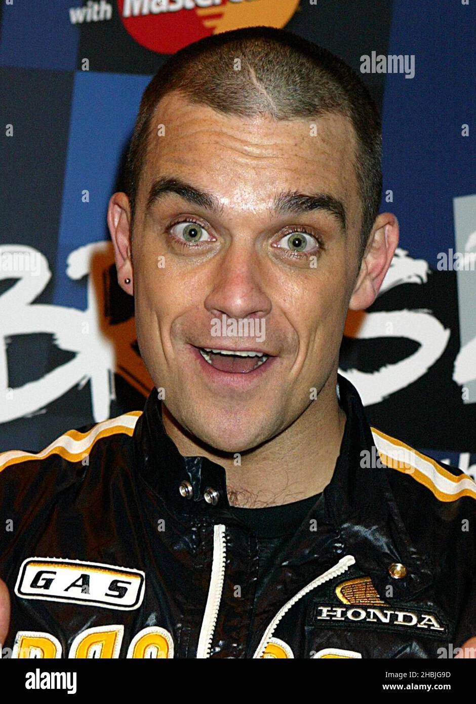 Robbie Williams in in the Press Room during the 25th Anniversary BRIT ...