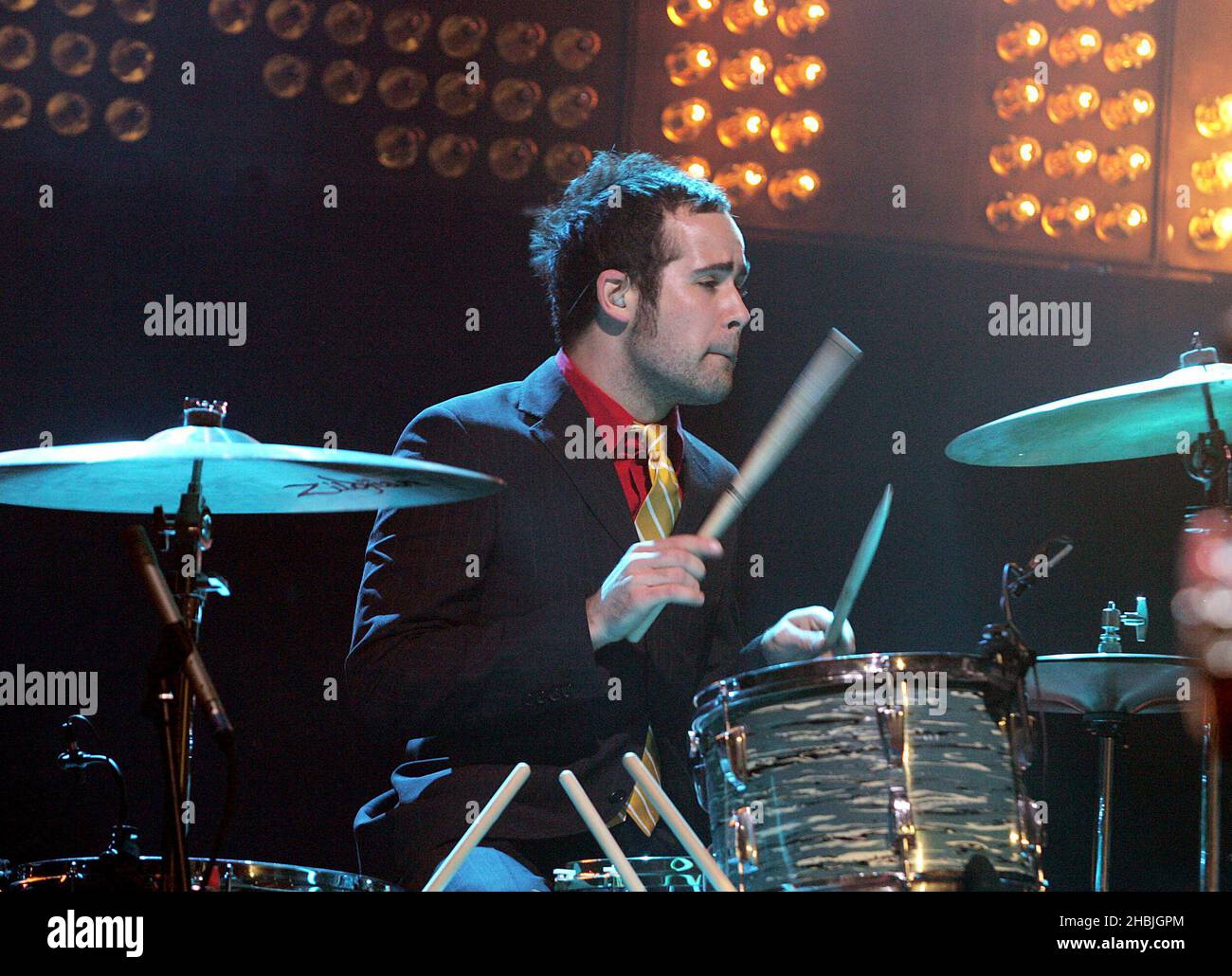 Brandon Flowers vocalist; Mark Stoemer; bass; RonnieVannucci; drummer ...