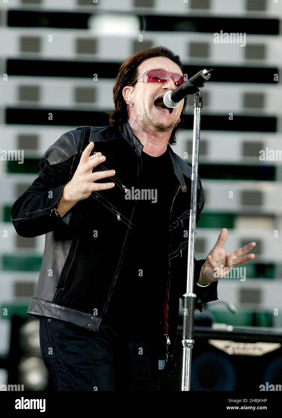 Bono of U2 perform on stage on the first London night of their "Vertigo ...