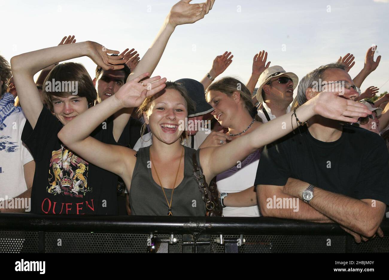 Crowd fans at Queen performing live on stage at Hyde Park in London ...