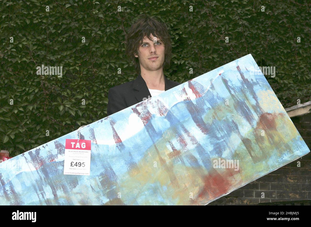 Jackson Scott poses with artwork going under the hammer in first ever Â ...