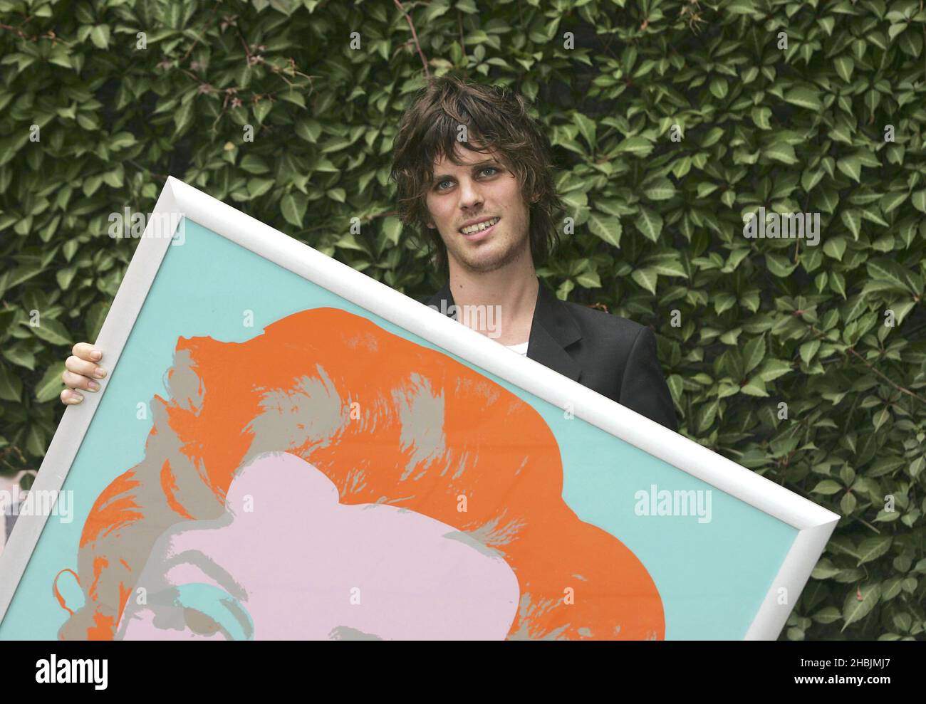 Jackson Scott poses with artwork going under the hammer in first ever Â ...