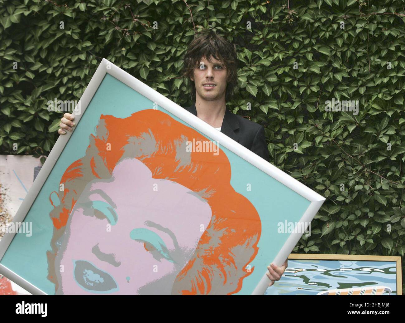 Jackson Scott poses with artwork going under the hammer in first ever Â ...