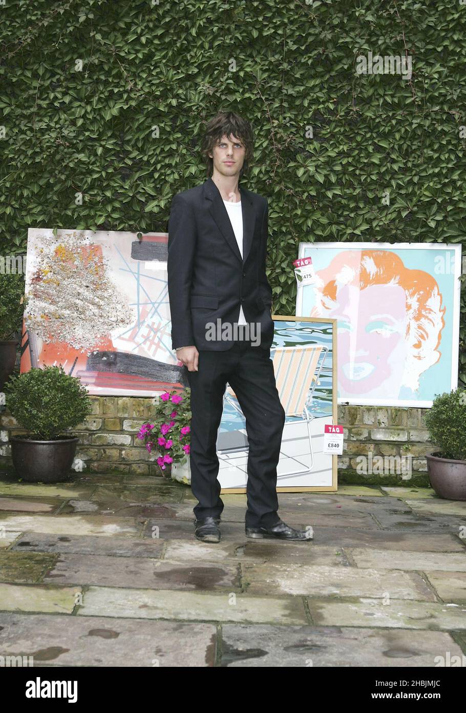 Jackson Scott poses with artwork going under the hammer in first ever Â ...