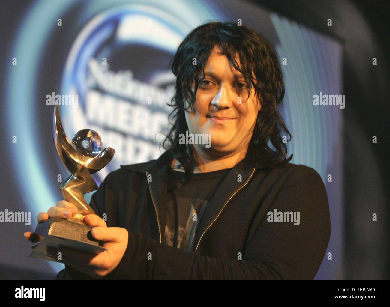 Anthony Hegarty receives award from Jools Holland on stage at the ...