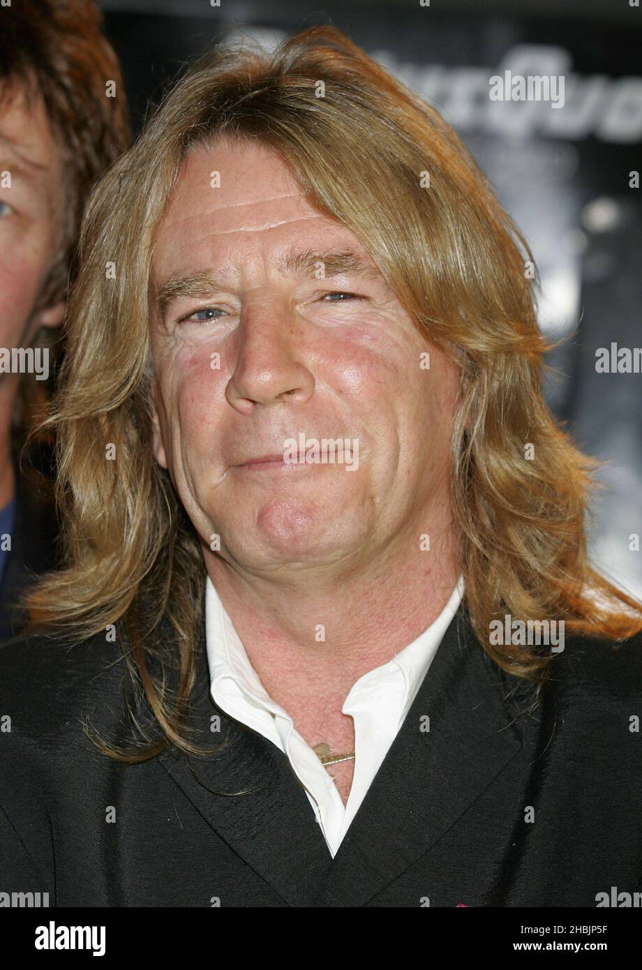 Rick Parfitt; of Status Quo w posing backstage at the DVD Launch party ...