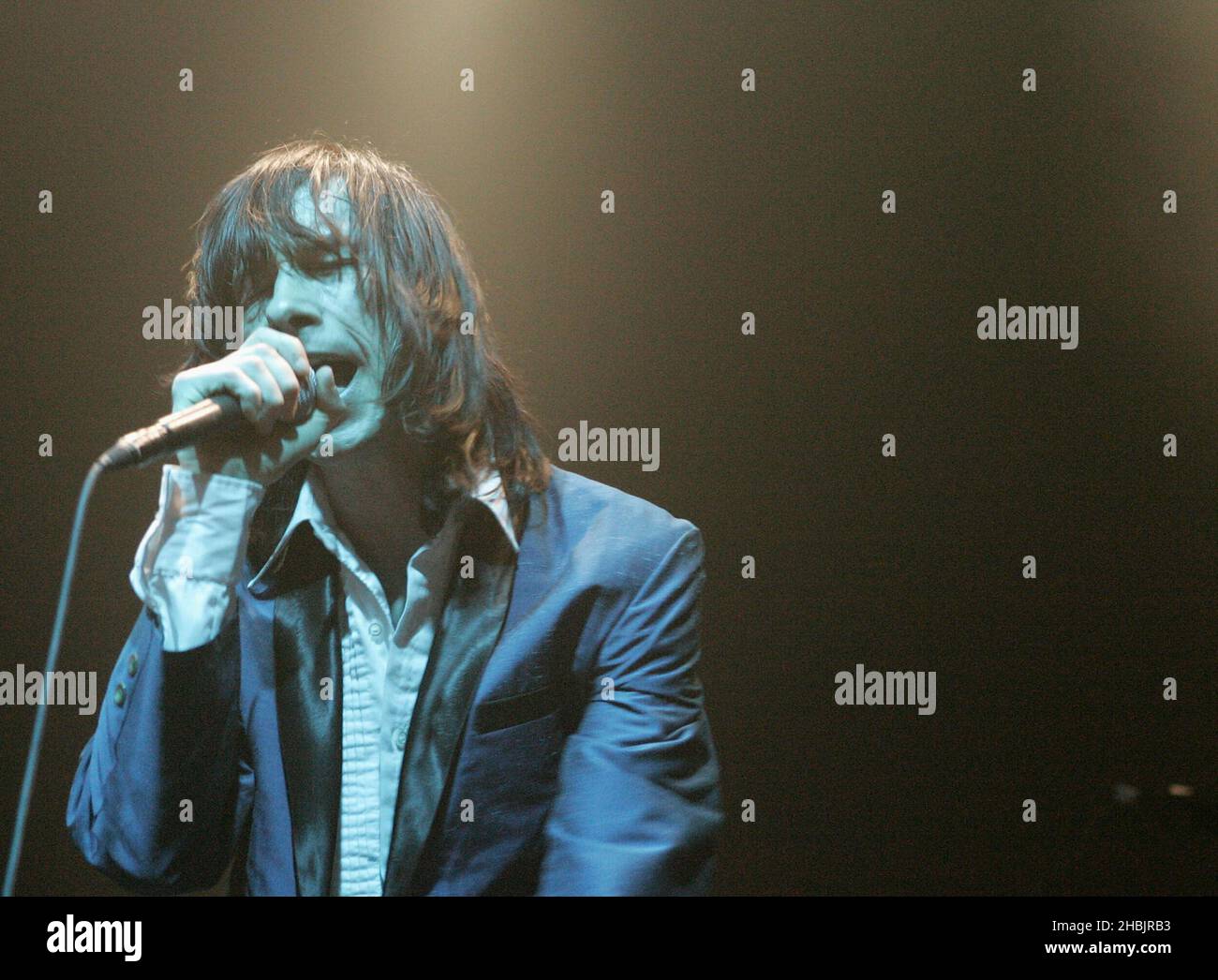Bobby Gillespie of Primal Scream live on stage Stock Photo - Alamy