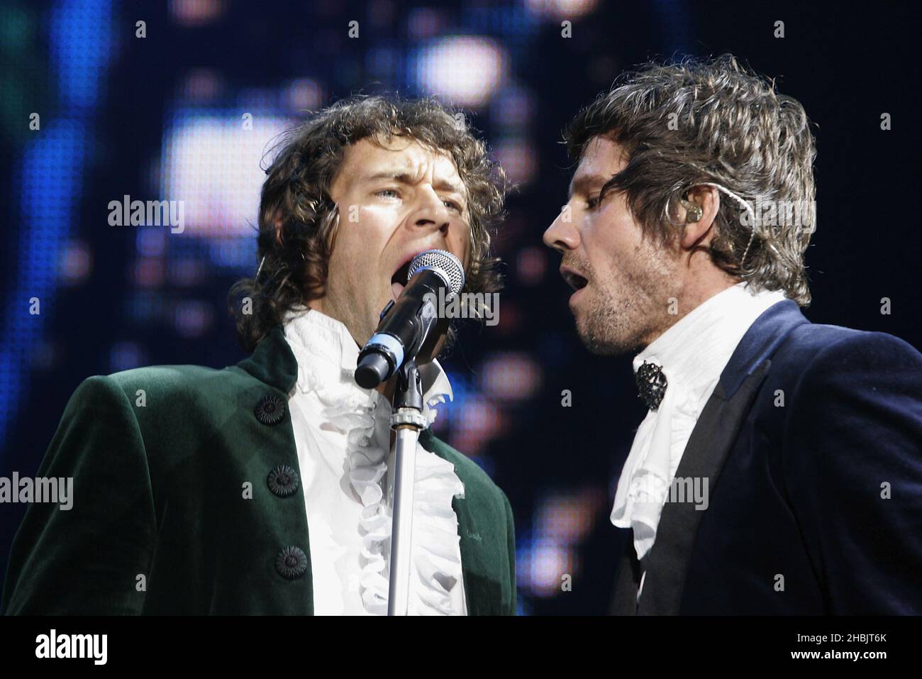 Jason Orange and Howard Donald of Take That on stage Stock Photo - Alamy