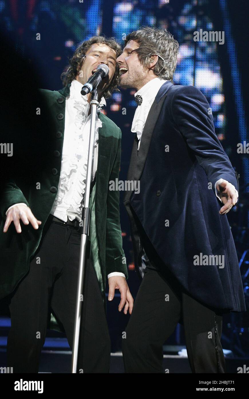 Jason Orange and Howard Donald of Take That on stage Stock Photo - Alamy