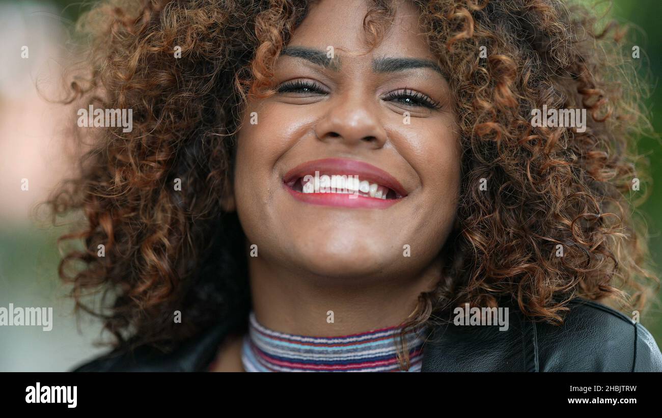 Brazilian woman face smiling emotion Stock Photo - Alamy