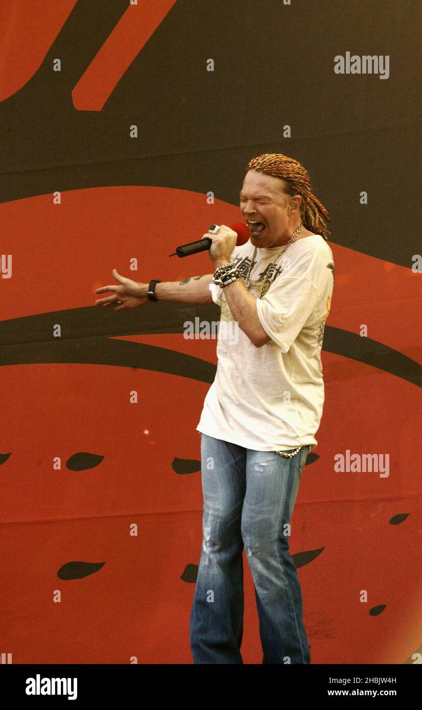 Axl Rose of Guns n Roses performing (view from the crowd Stock Photo ...