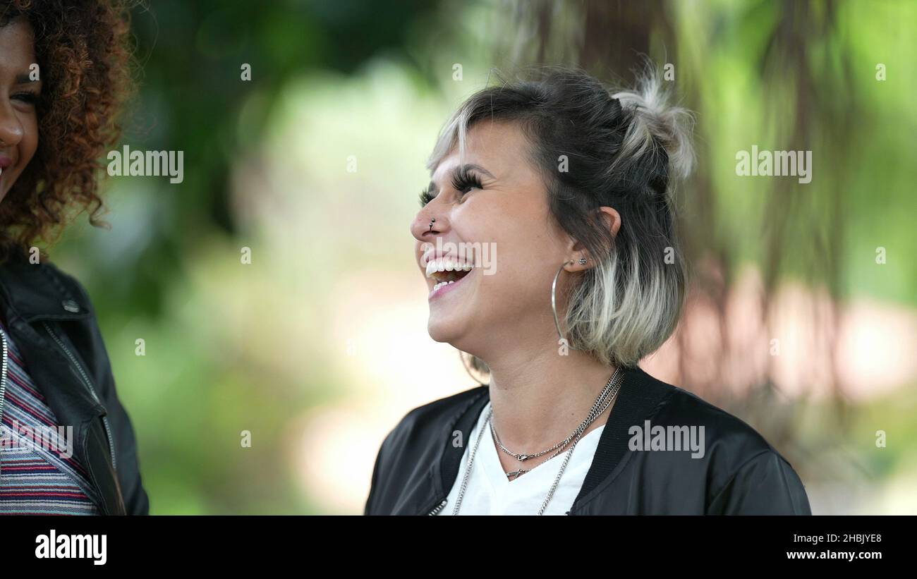 Diverse woman together laughing and smiling, authentic real life people ...