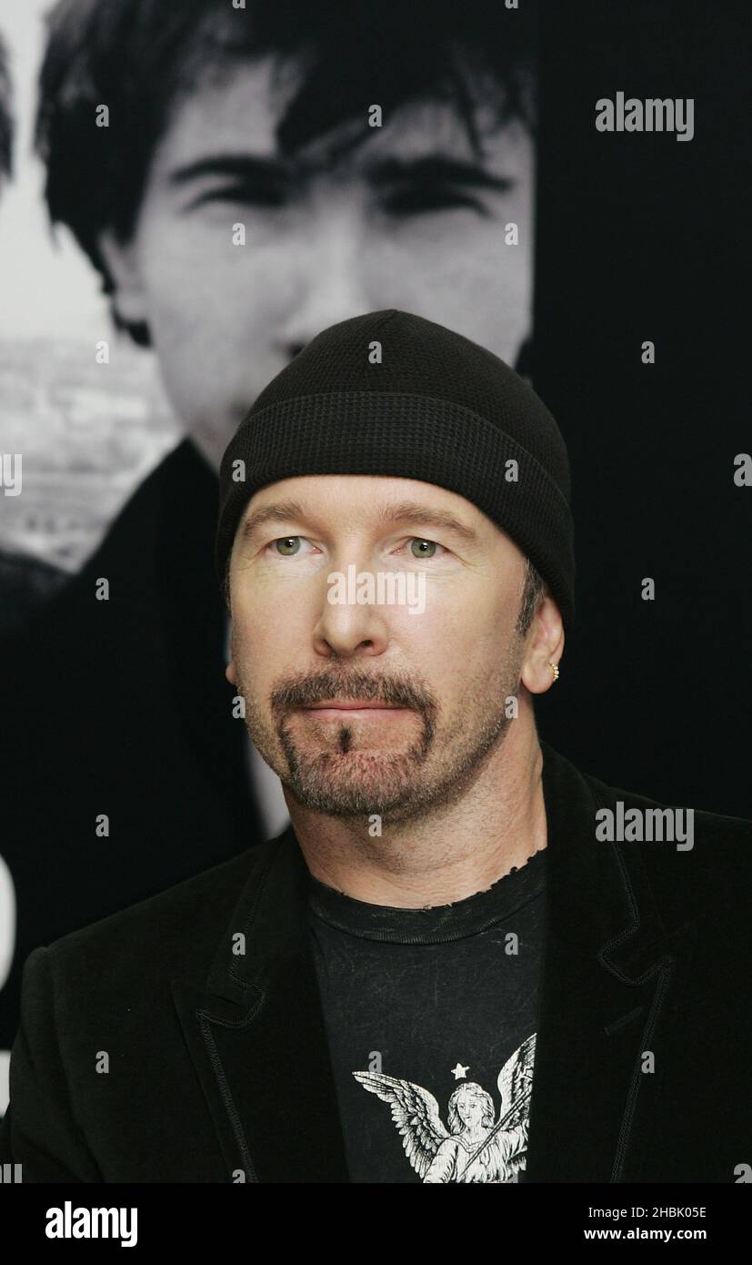 The edge attends a u2 book signing for their book hi-res stock ...