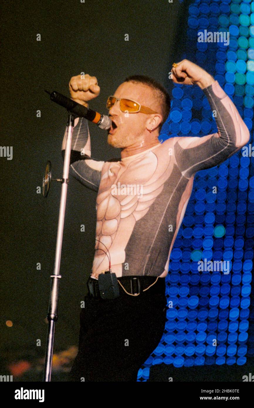 U2 singer bono flexes his muscles on stage hi-res stock photography and ...
