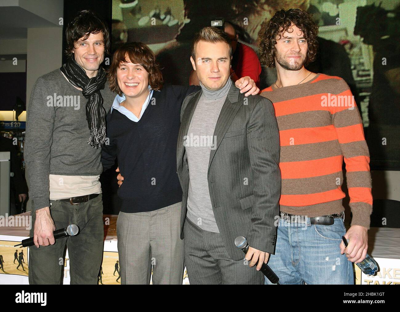 Members of the band Take That, (left to right:) Jason Orange, Mark Owen ...