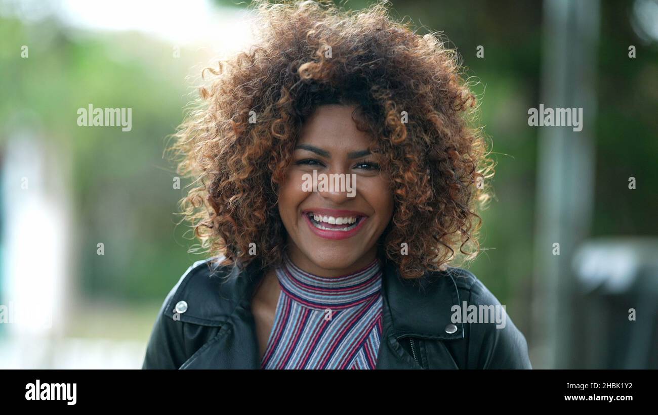 Happy Brazilian woman smiling portrait face Stock Photo - Alamy