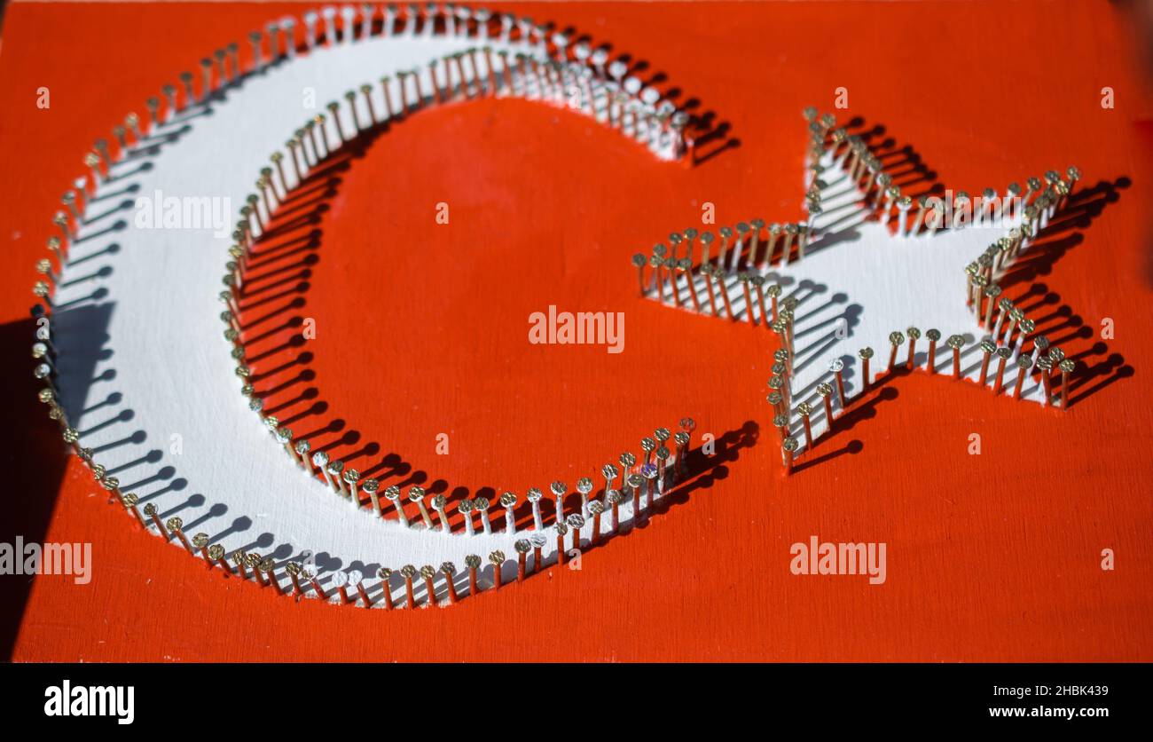 Turkish national flag with white star in view Stock Photo - Alamy