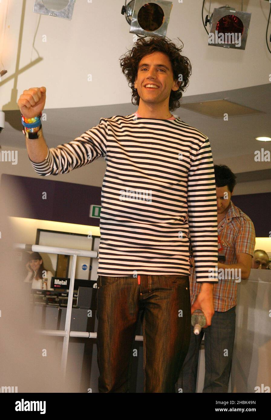 Mika performs his latest single at HMV Oxford Street in London on April ...