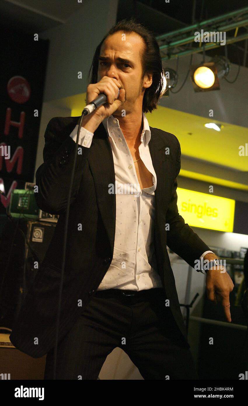 Nick Cave and his band Grinderman perform during a ceremony to announce the MOJO Honours List at ...