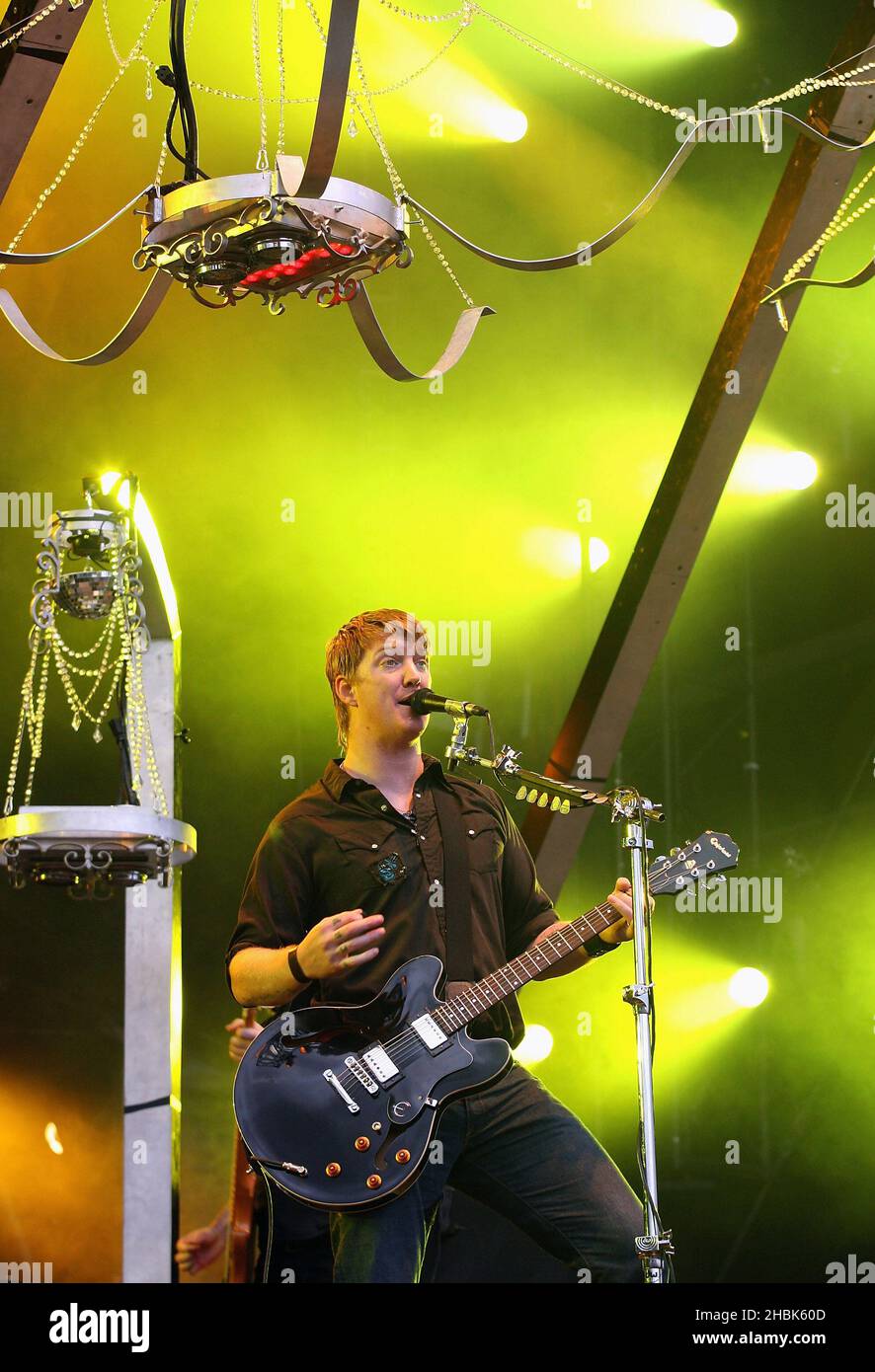 Josh Homme and his band Queens of the Stone Age perform on stage at the ...