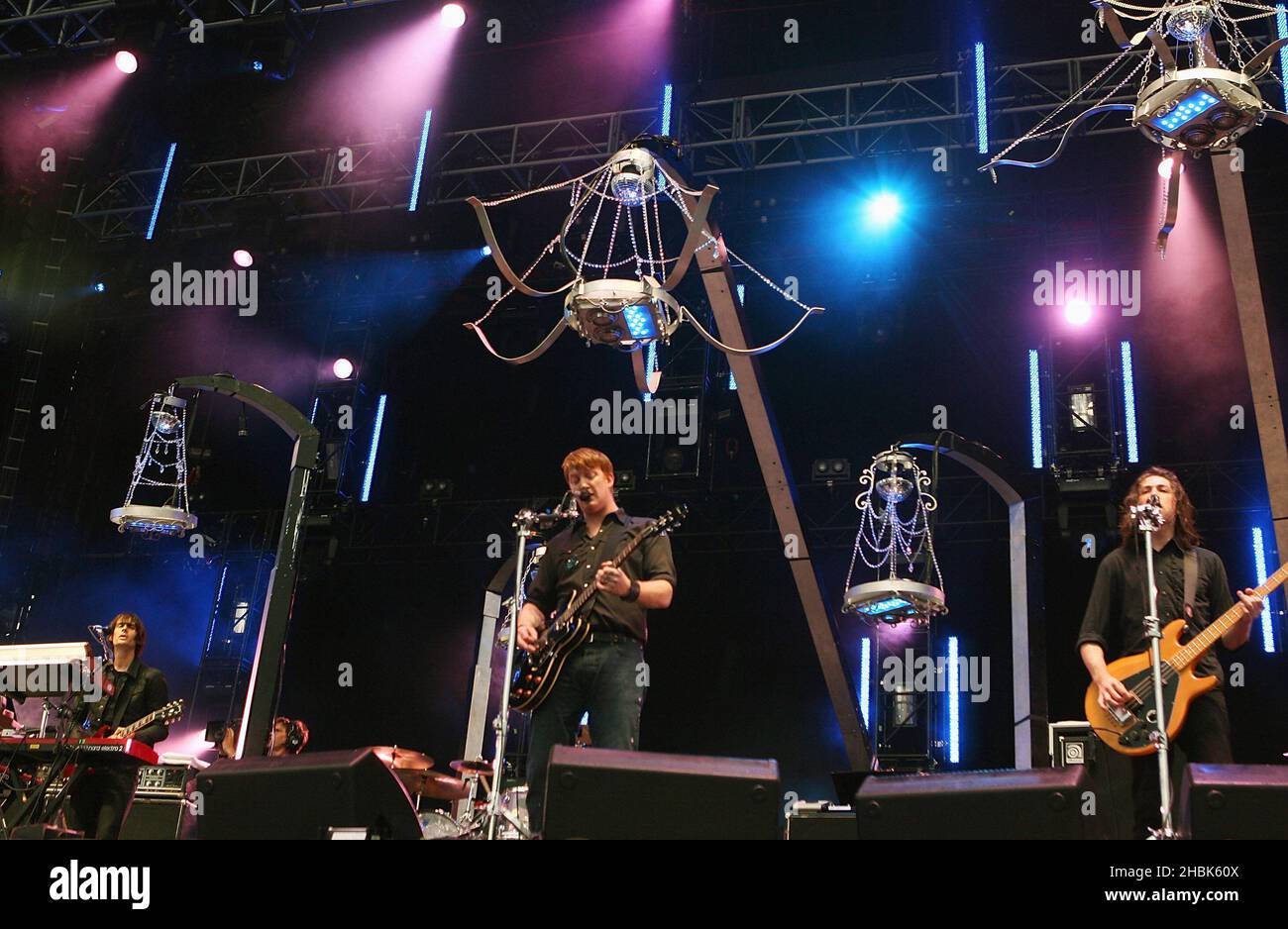Josh Homme and his band Queens of the Stone Age perform on stage at the ...