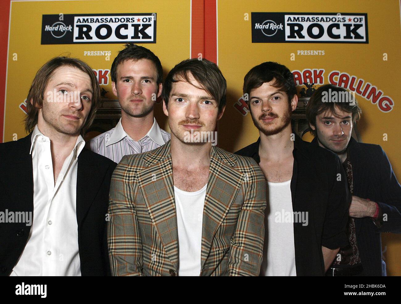 Dan Gillespie Sells poses with his band The Feeling backstage at the ...