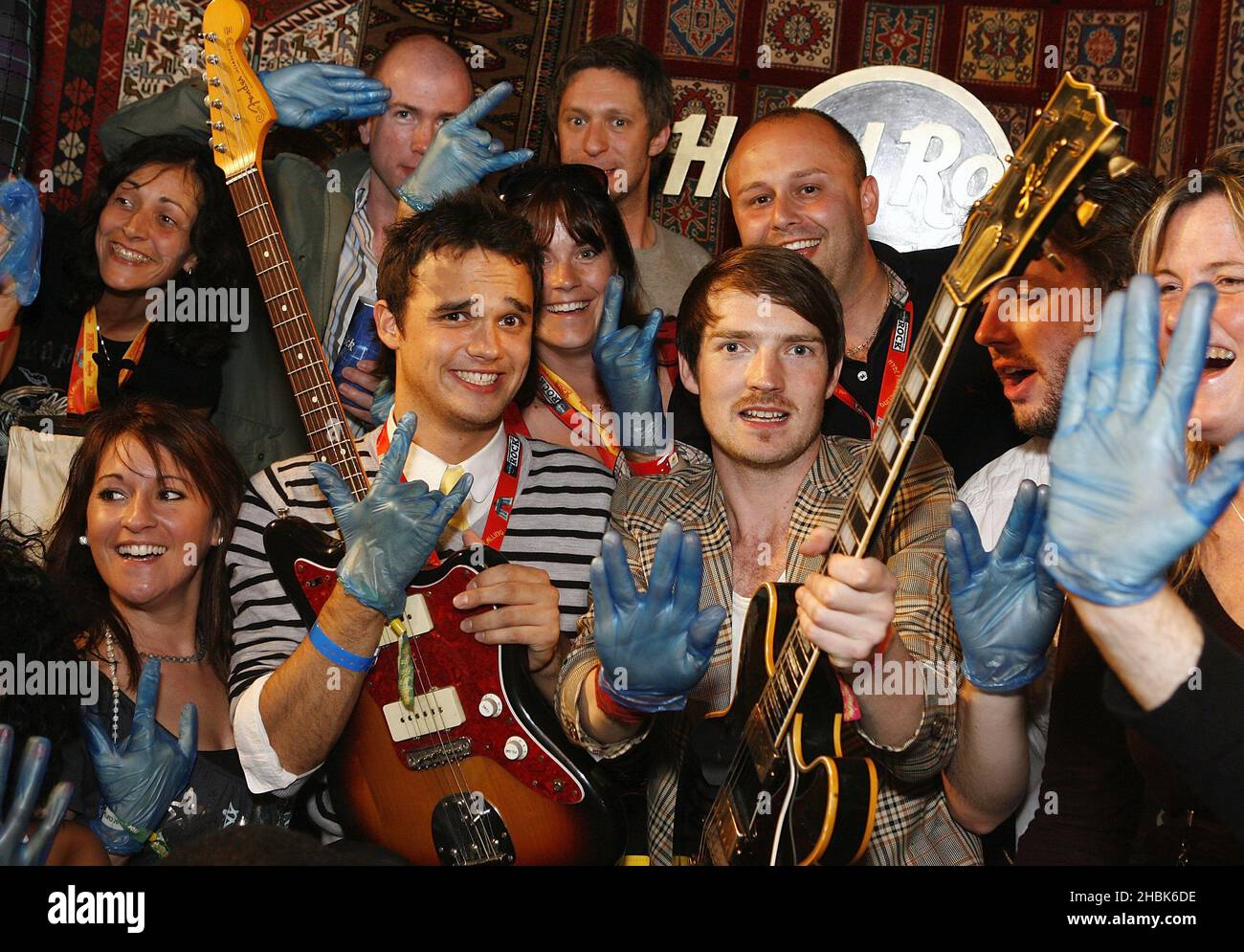 Gareth Gates and Dan Gillespie Sells of The Feeling pose backstage at ...