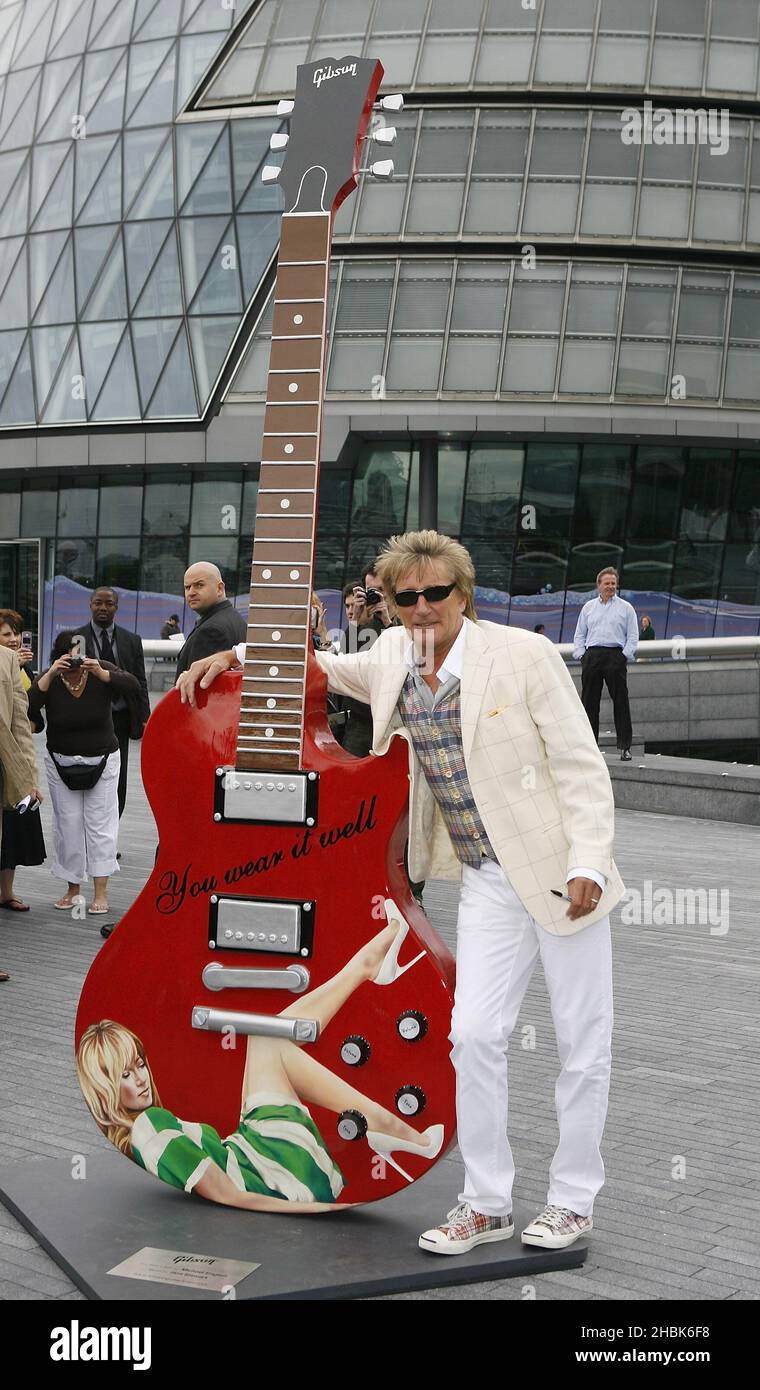 Singer Rod Stewart signs Gibson Guitar replica at Gibson Guitartown ...