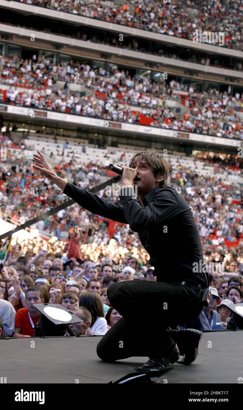 Tom Chaplin on stage during Keane's performance during the charity ...