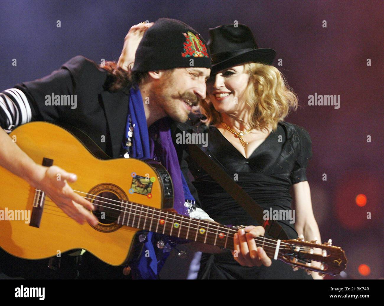 Madonna and Ukranian singer Eugene Hutz perform during the charity ...