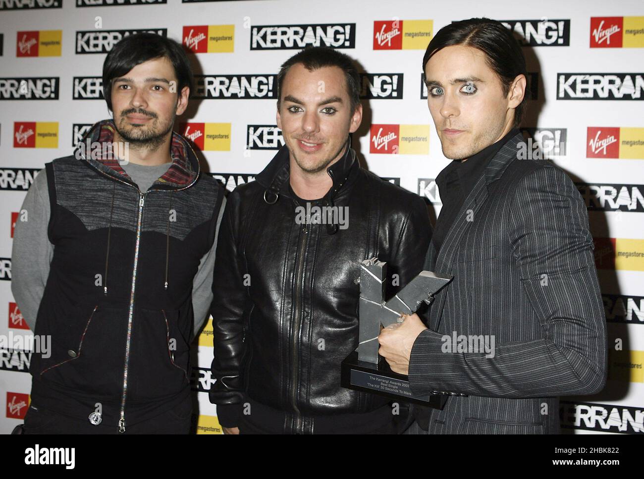 Jared Leto (right) and his band 30 Seconds to Mars with the award for ...