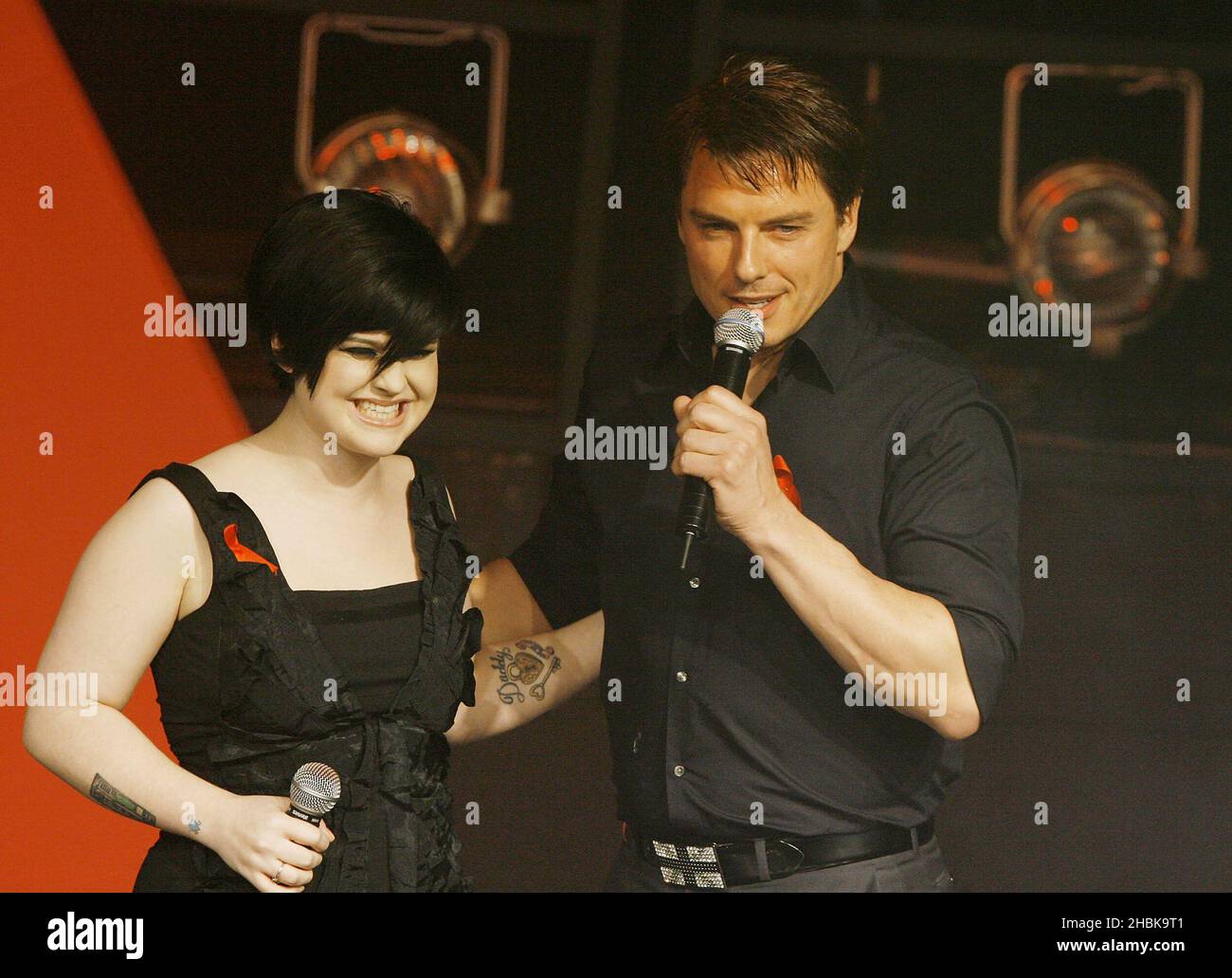 Kelly Osbourne on stage with John Bannerman at the 15th Anniversary at ...