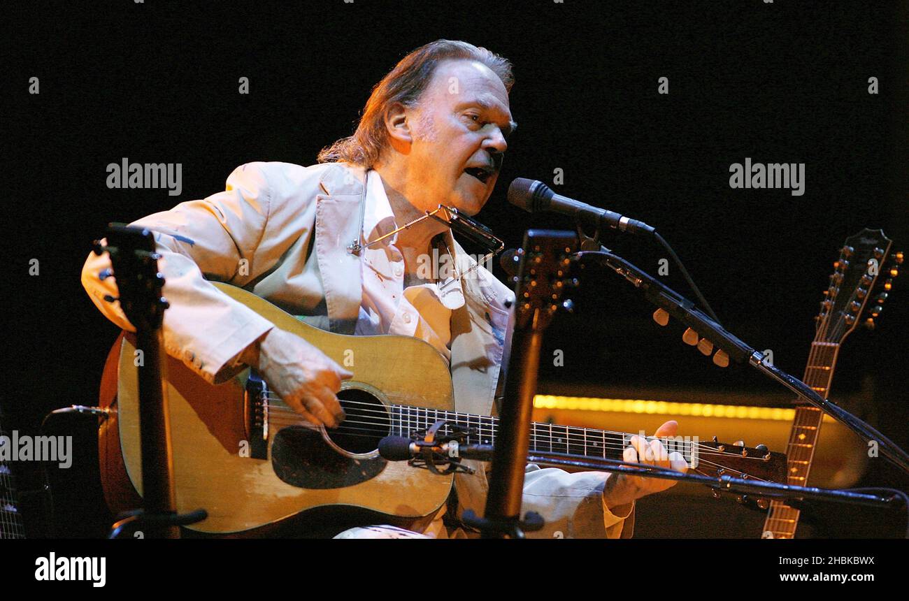 Neil Young performing the acoustic half of his concert at the ...