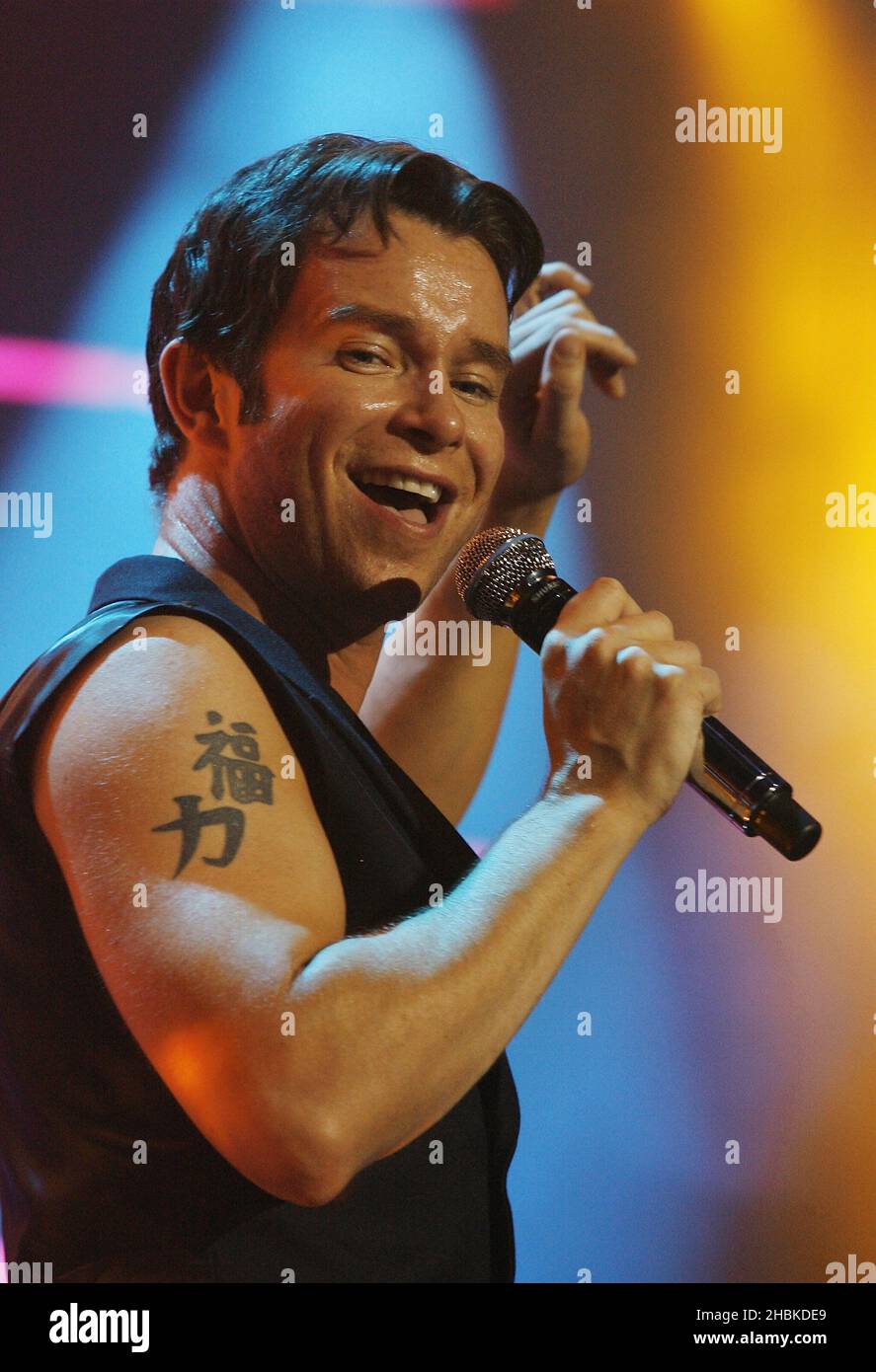 Stephen Gately of Boyzone performs at the 02 Arena, London Stock Photo ...