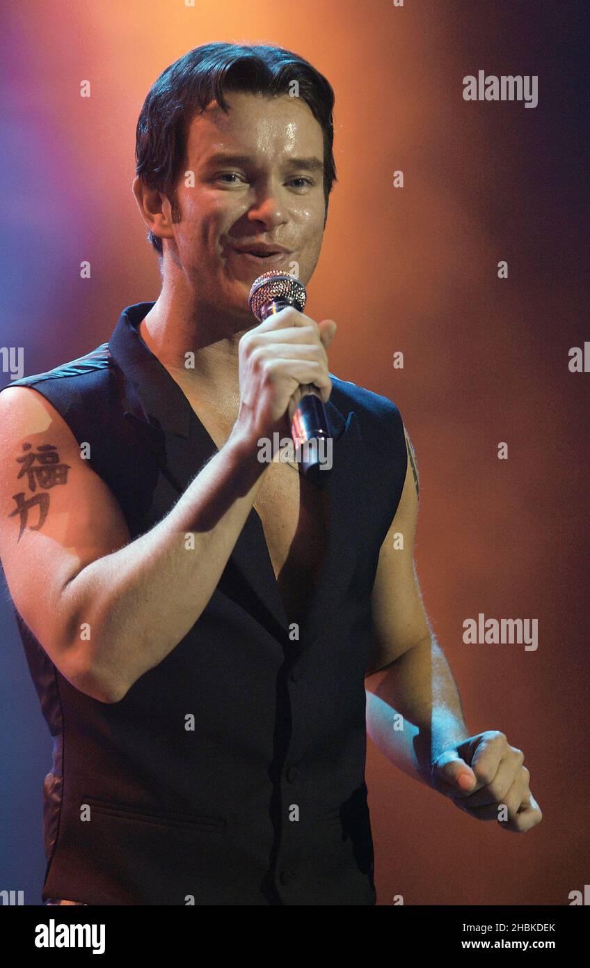 Stephen Gately of Boyzone performs at the 02 Arena, London Stock Photo ...