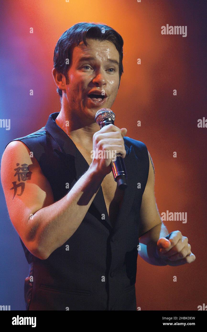 Stephen Gately of Boyzone performs at the 02 Arena, London Stock Photo ...