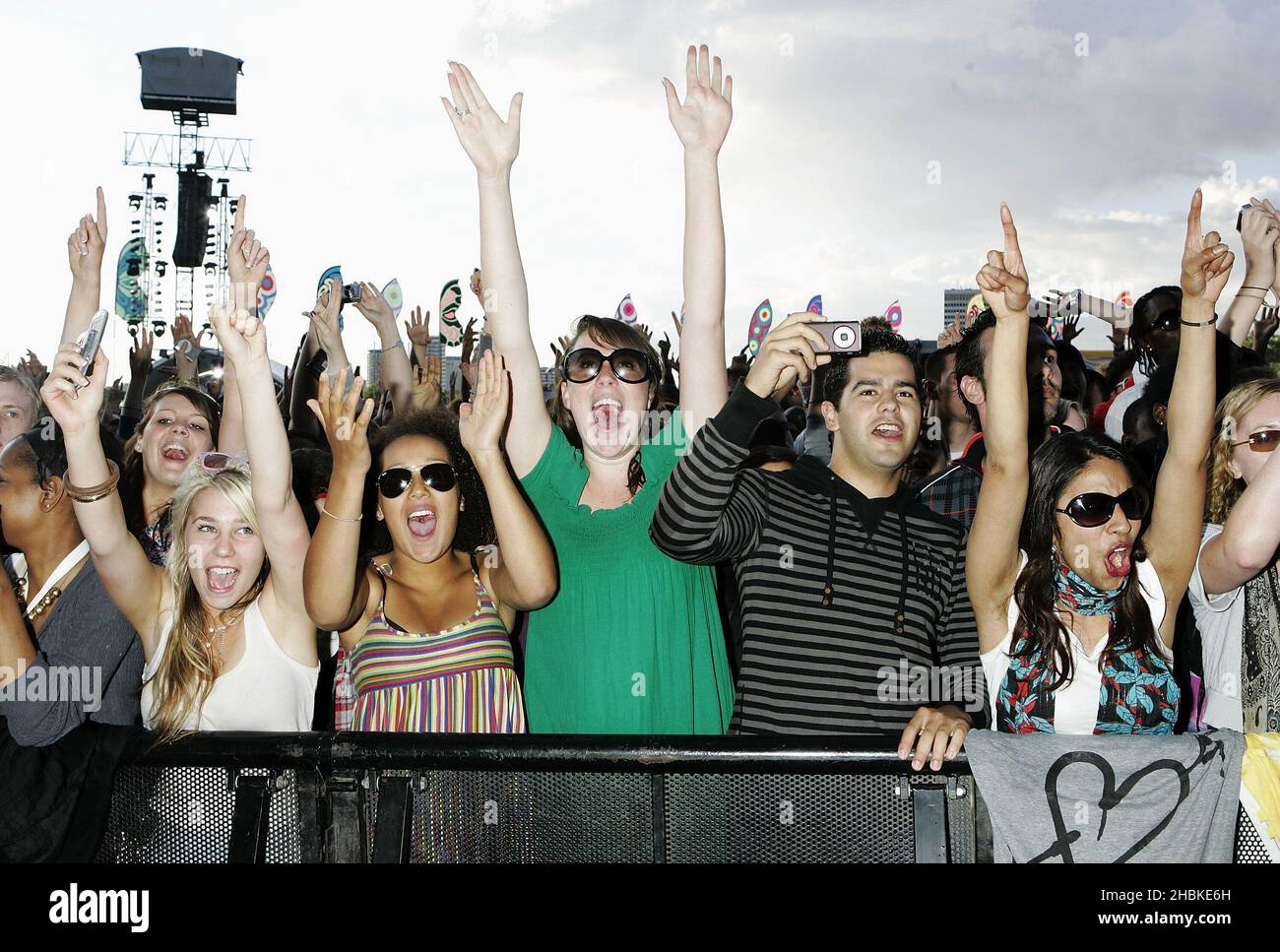 The crowd watching Jay Z performing on stage during the opening day of ...