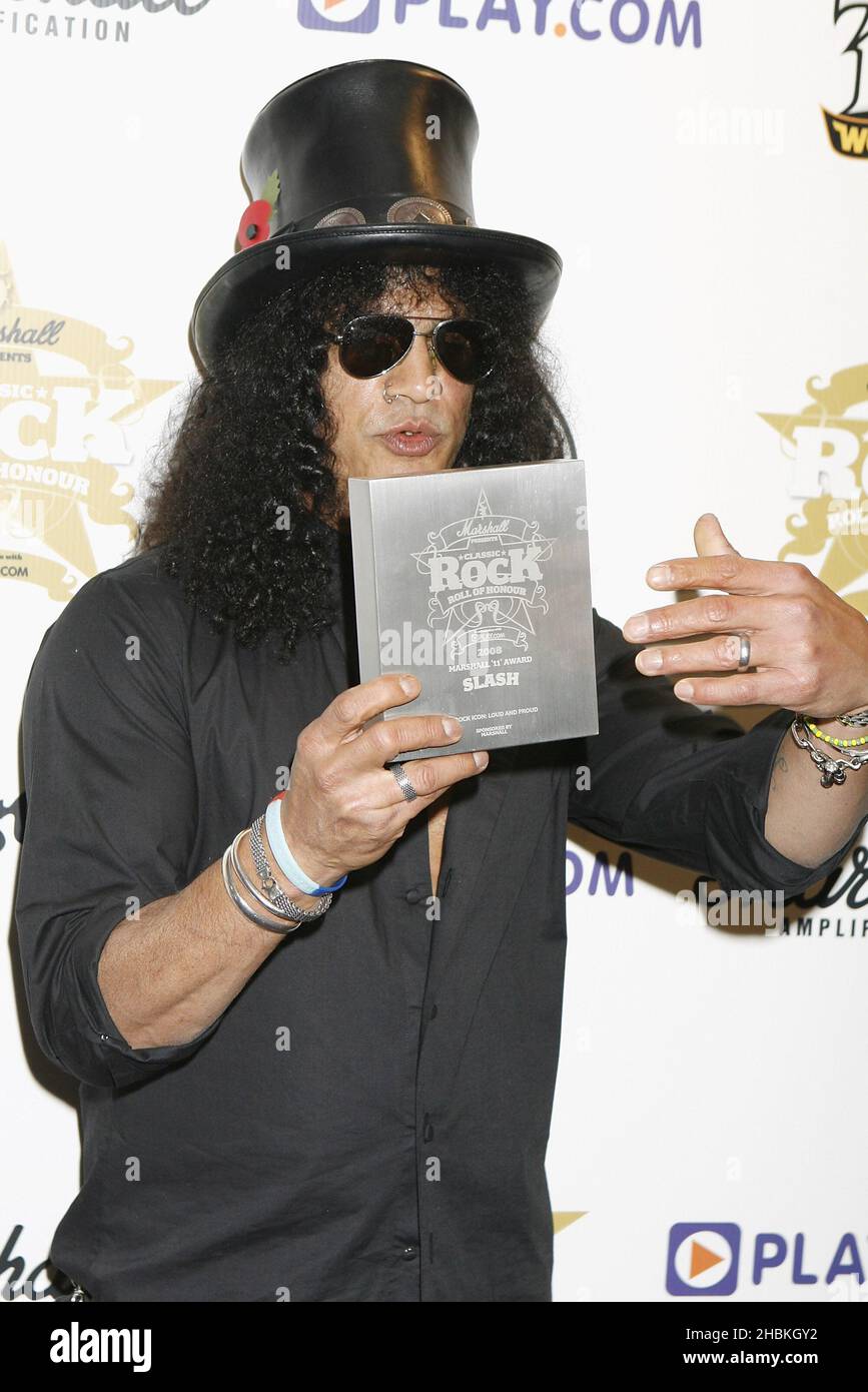 Slash poses with his marshall 11 award hi-res stock photography and ...