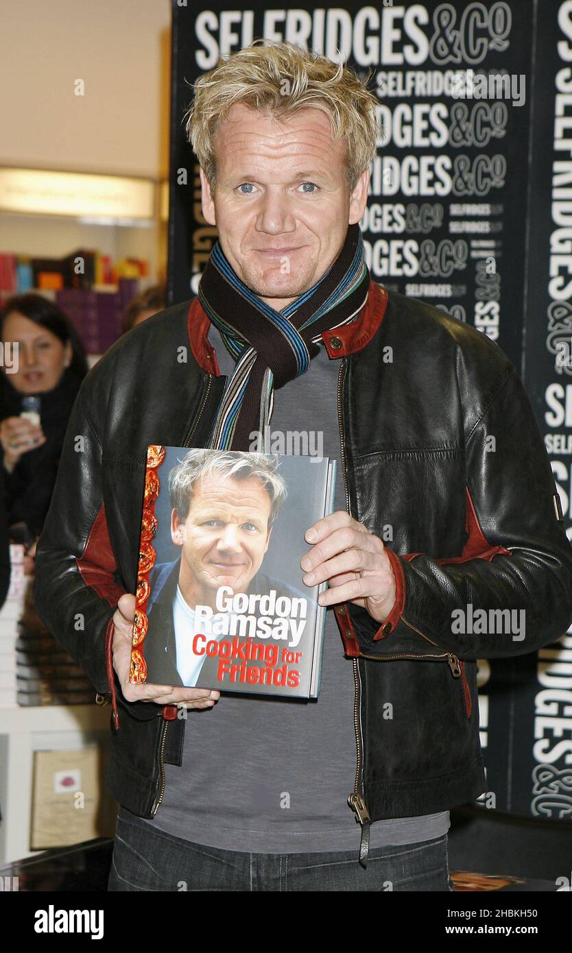 Gordon Ramsay signs copies of his latest book, 'Cooking For Friends ...