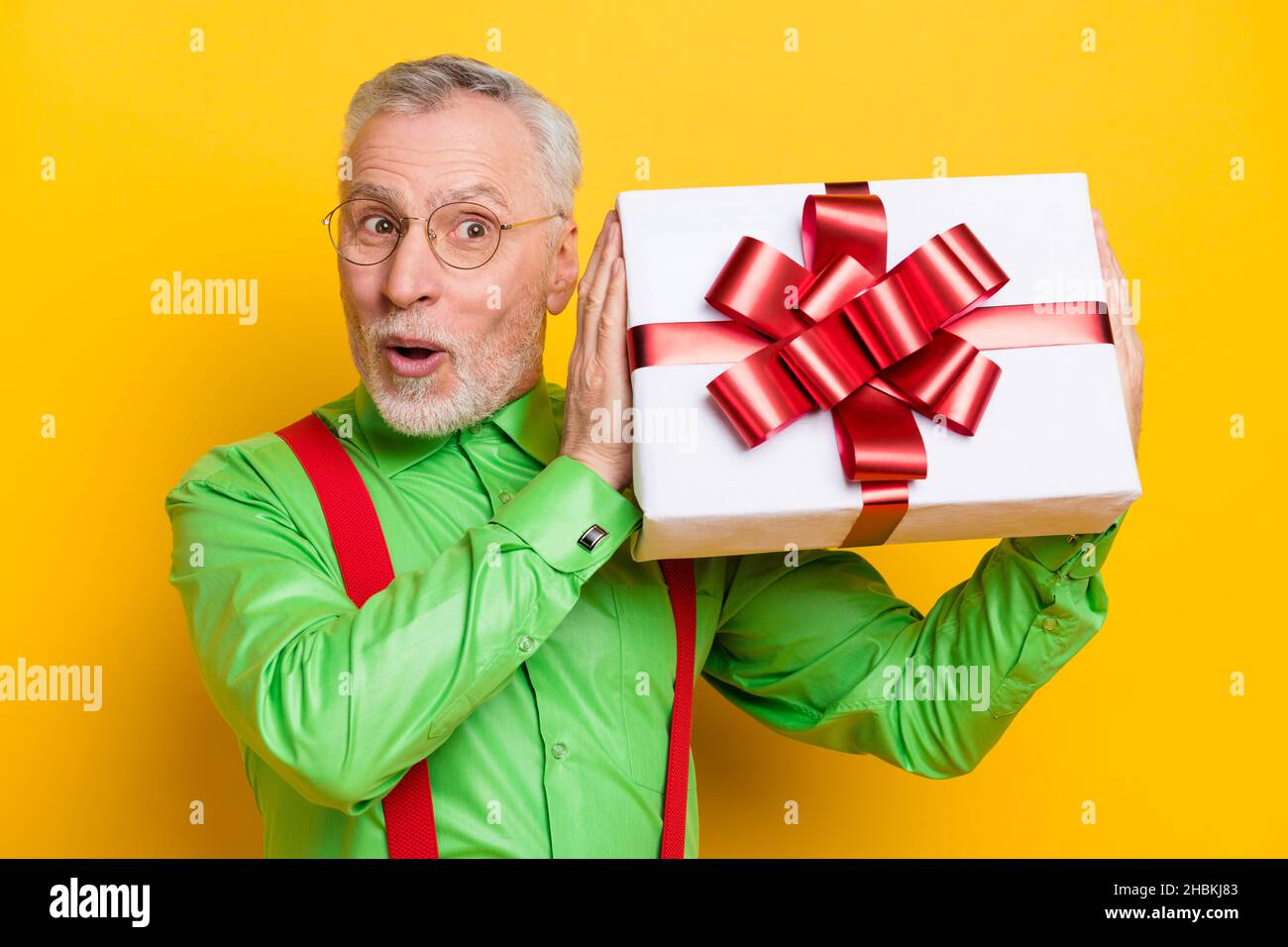 Photo of aged man happy positive smile curious shake gift box birthday ...