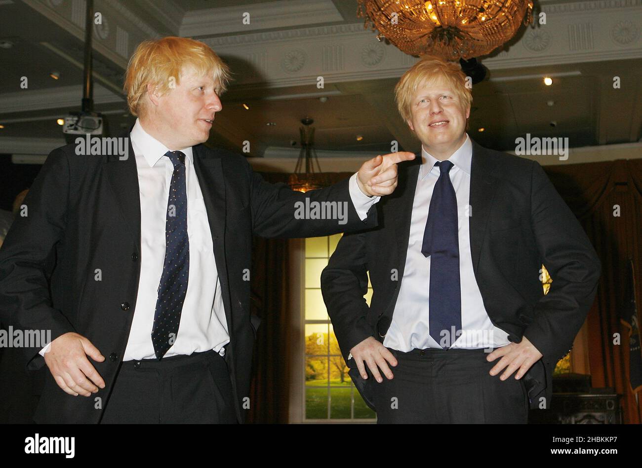 Boris Johnson poses with his wax model at Madame Tussauds in London ...
