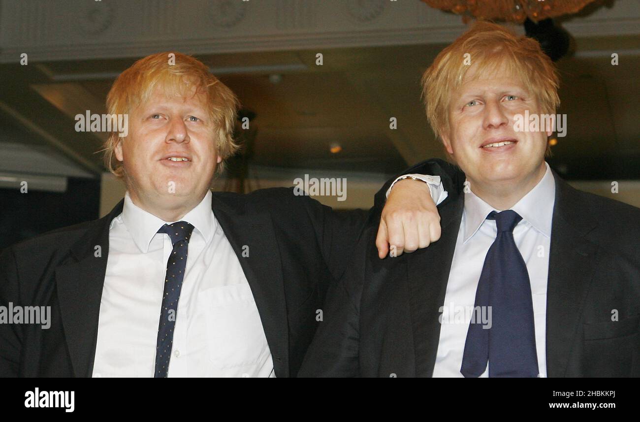 Boris Johnson poses with his wax model at Madame Tussauds in London ...