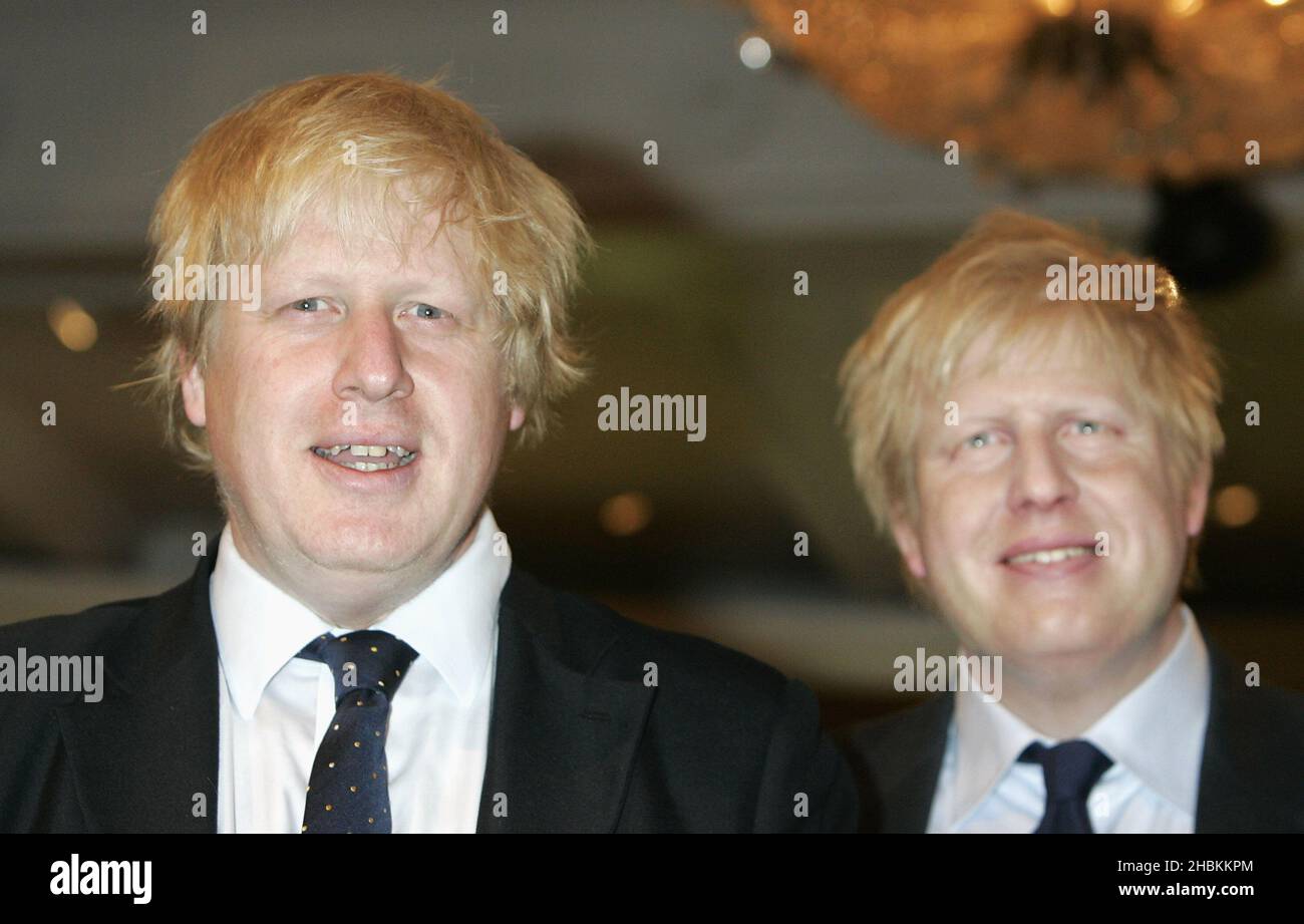 Boris Johnson poses with his wax model at Madame Tussauds in London ...